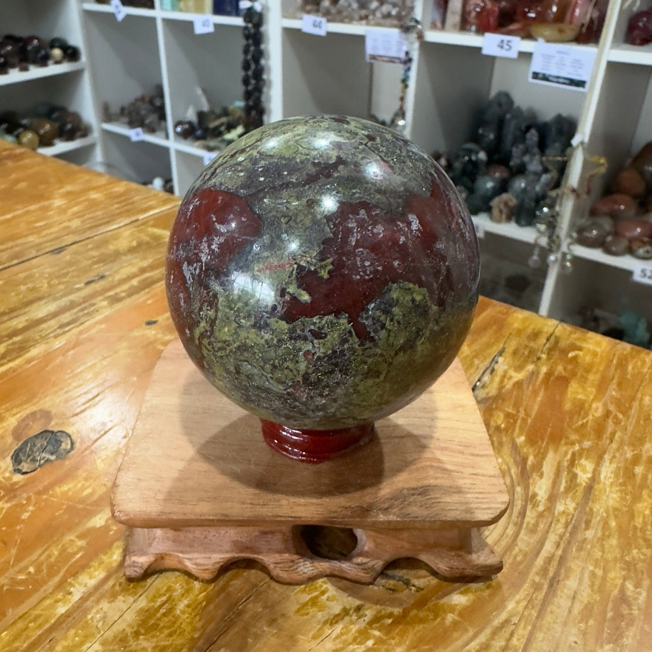 Dragon Blood Stone Sphere – Crystals by Sisters