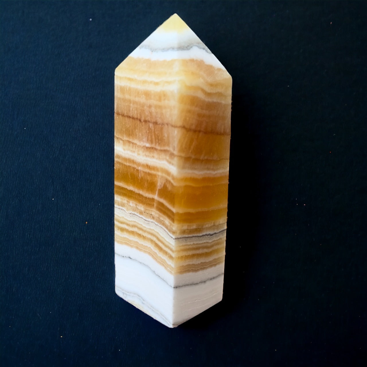 Orange Banded Calcite Point – Crystals by Sisters