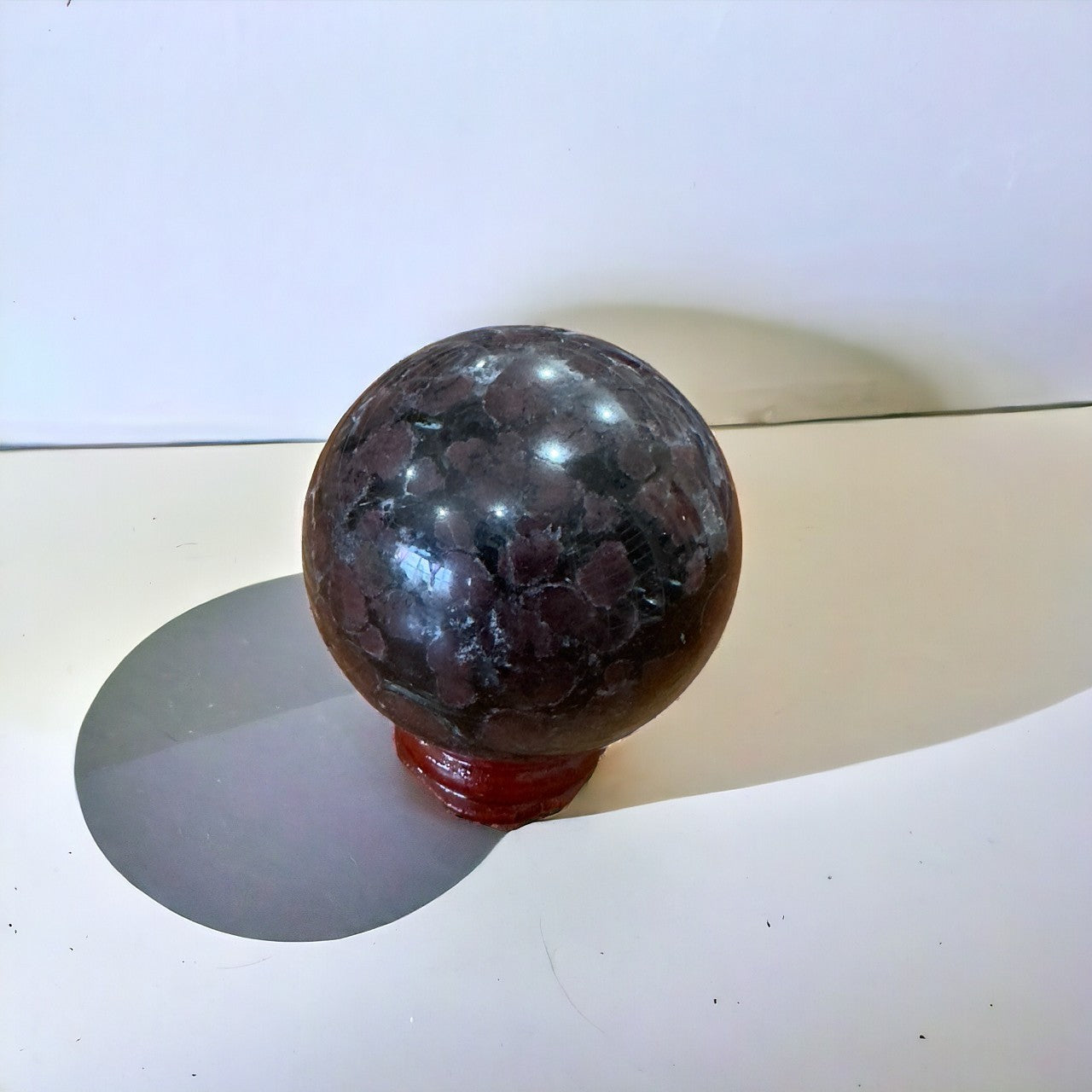 Garnet & Astrophylite Sphere – Crystals by Sisters